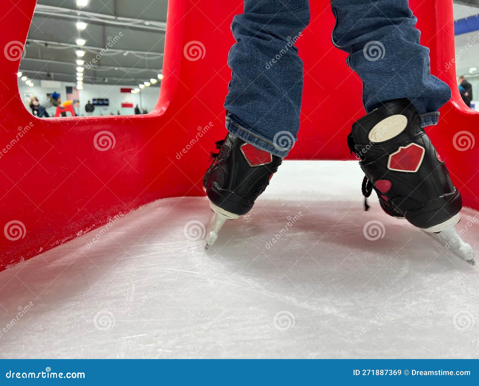 Beginner Ice Skater Using a Plastic Walker for Assistance. Stock Image ...
