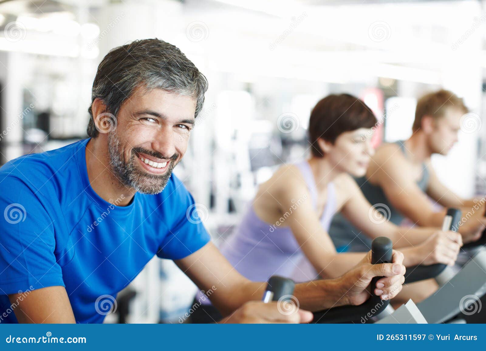 The Beginning of the Circuit. a Row of People Working Out on the ...
