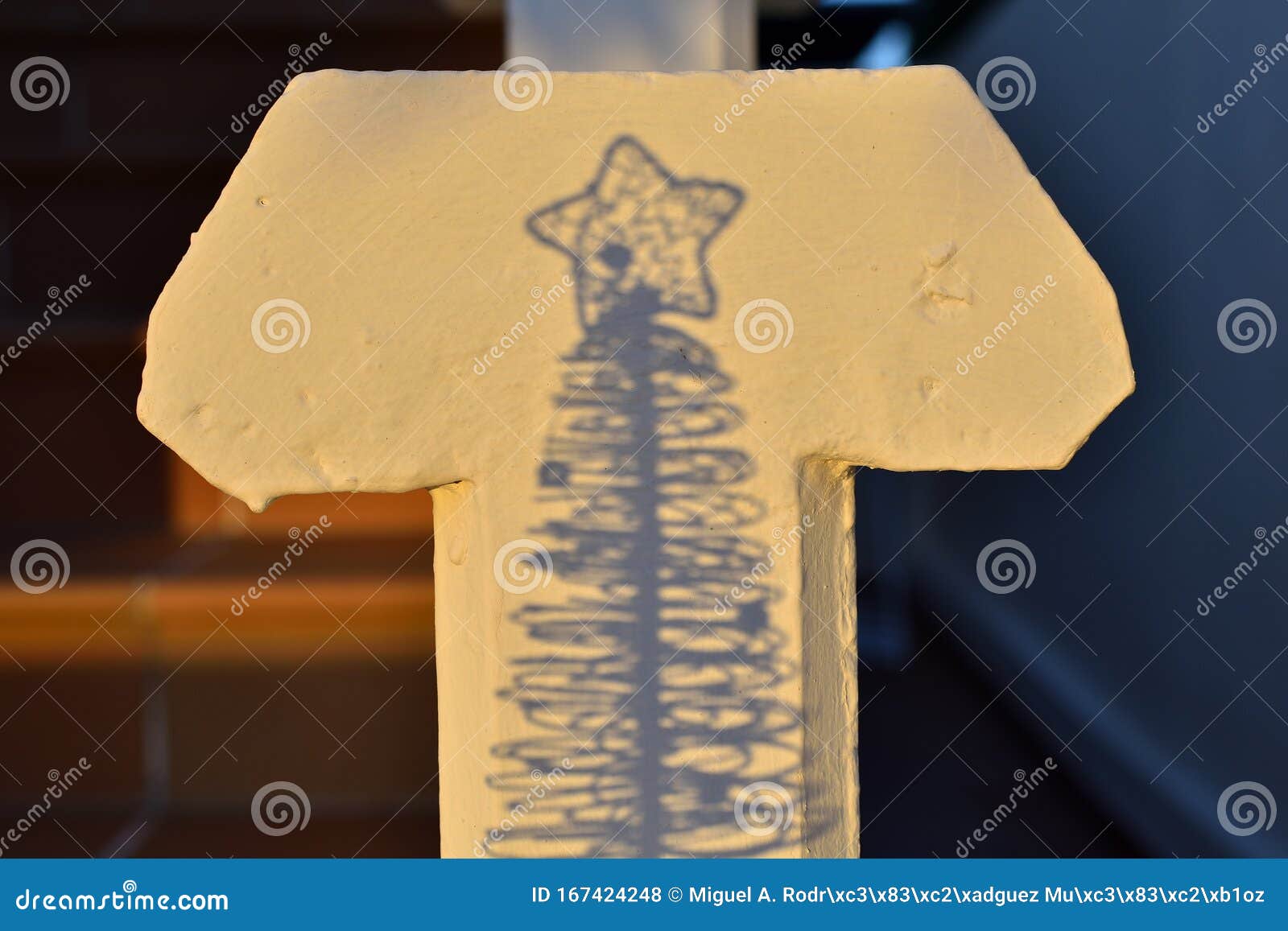 The Beginning and the End: Shadow of a Small Christmas Tree on a Cross ...