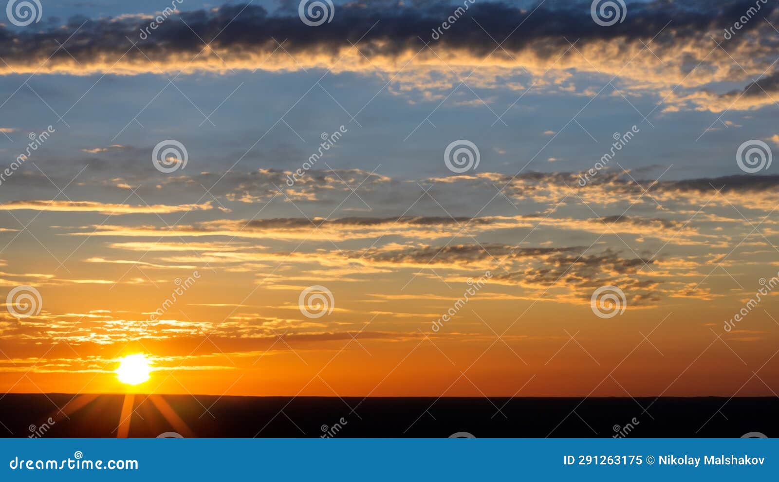 Beginning of a New Day: Sunrise and Cloudy Skies Stock Image - Image of ...
