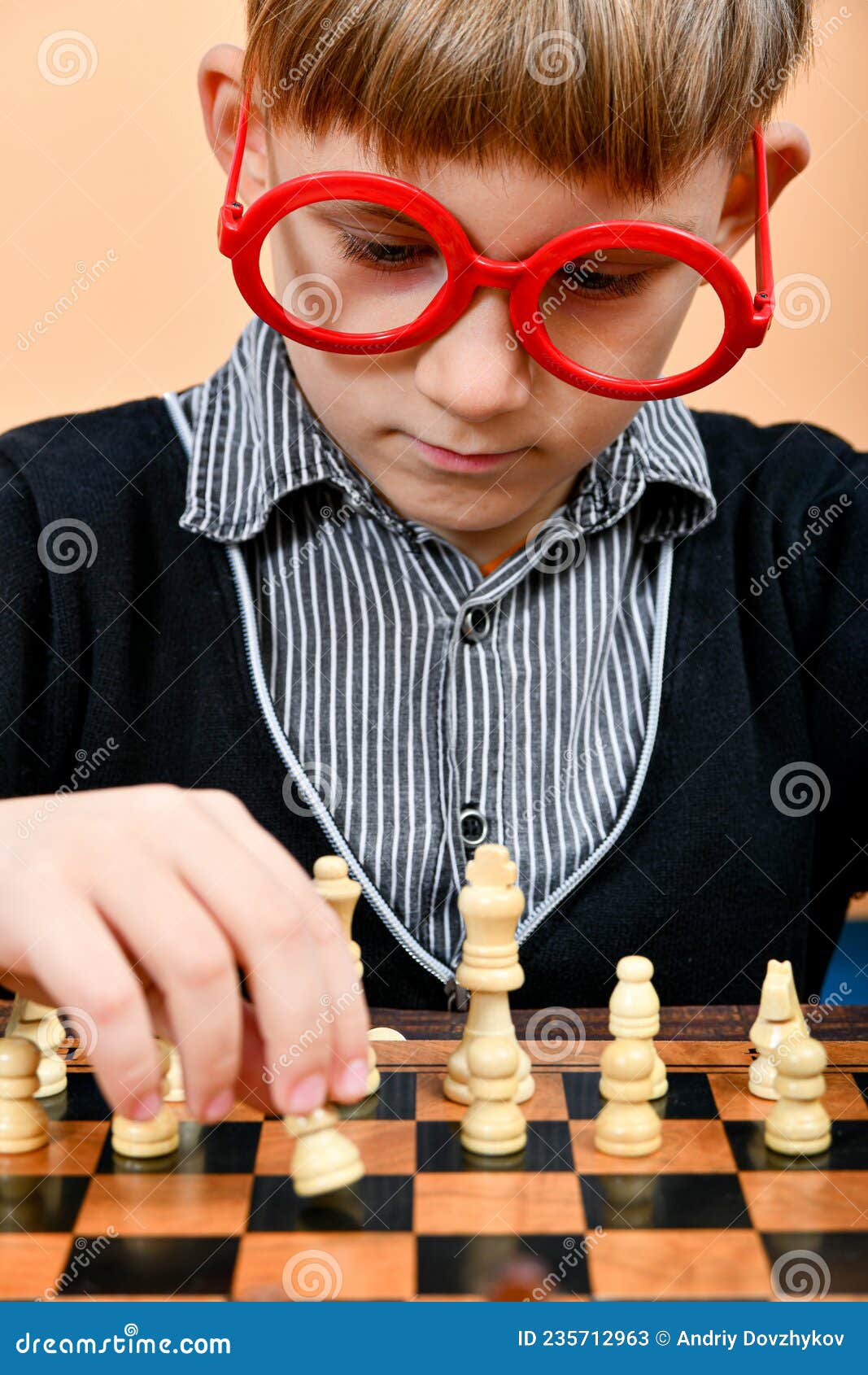 The Beginning of a New Game of Chess with a Young Smart Chess Player in ...