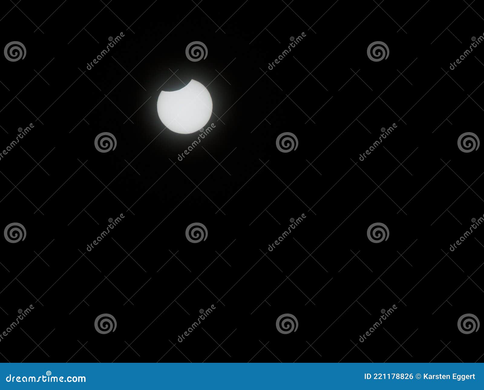 Beginning Solar Eclipse with the Moon in Front of the Sun Photographed ...
