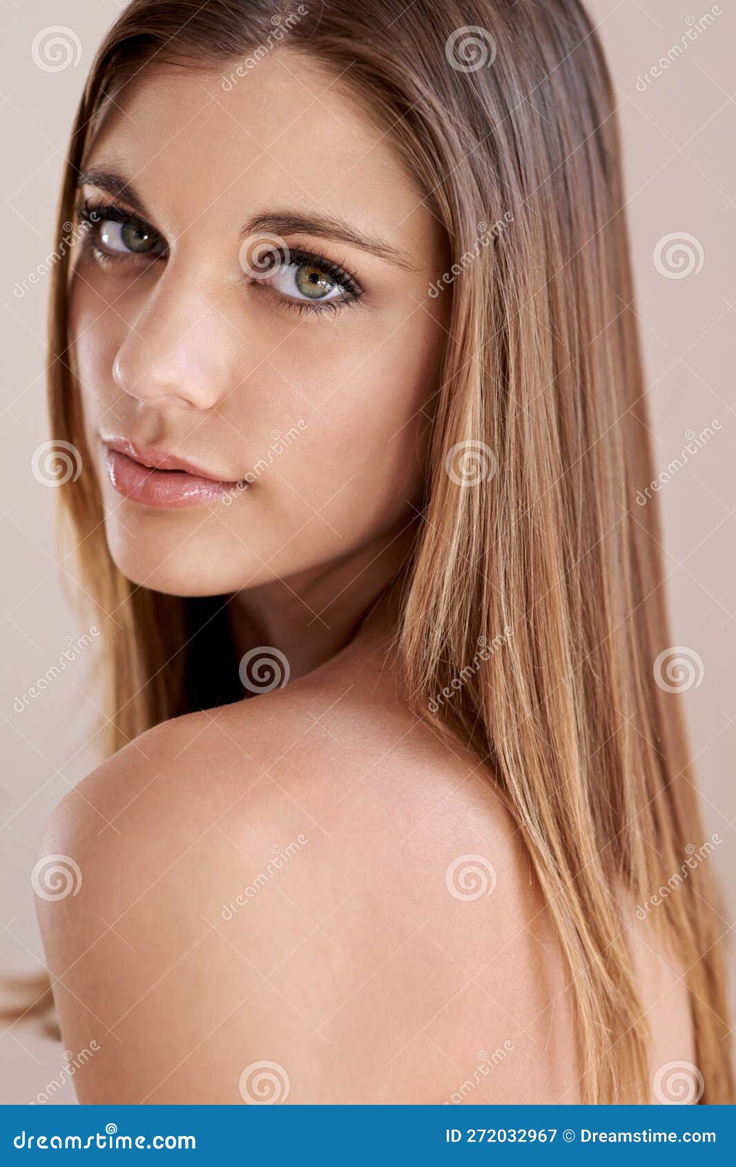Beguiling Beauty. Studio Portrait of an Attractive Model Gazing at the ...
