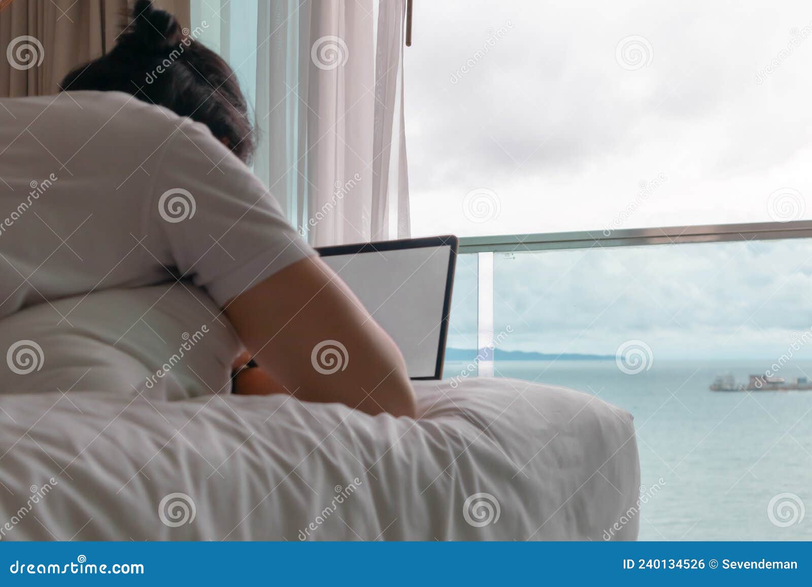 Concept Of Workation. Woman Work On Laptop In A Hotel Room With Sea ...