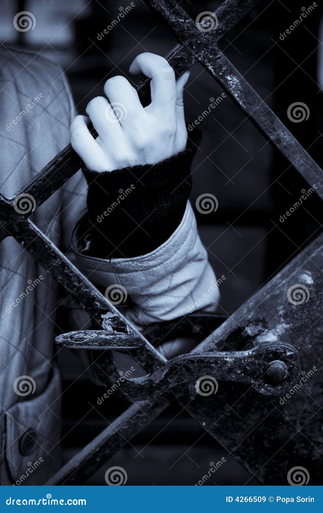 Behind bars stock image. Image of detainee, handcuffed - 4266509