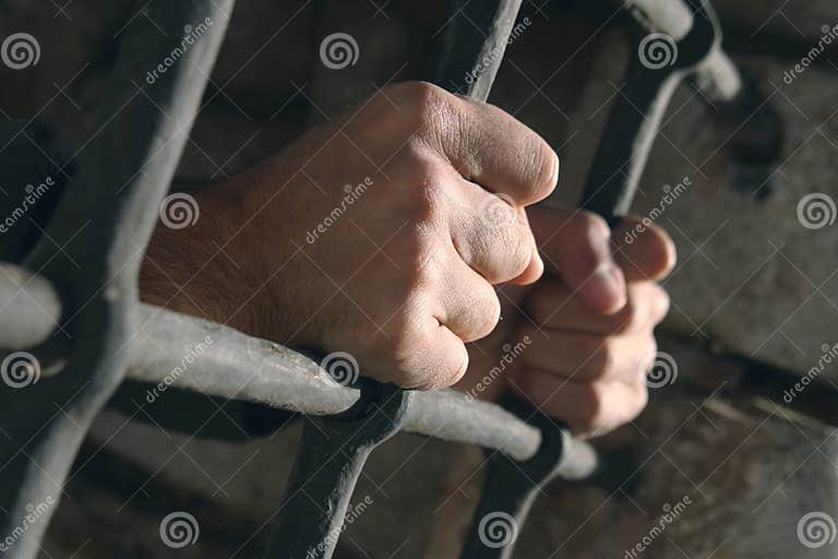 Behind bars stock image. Image of detainee, escape, convict - 44853
