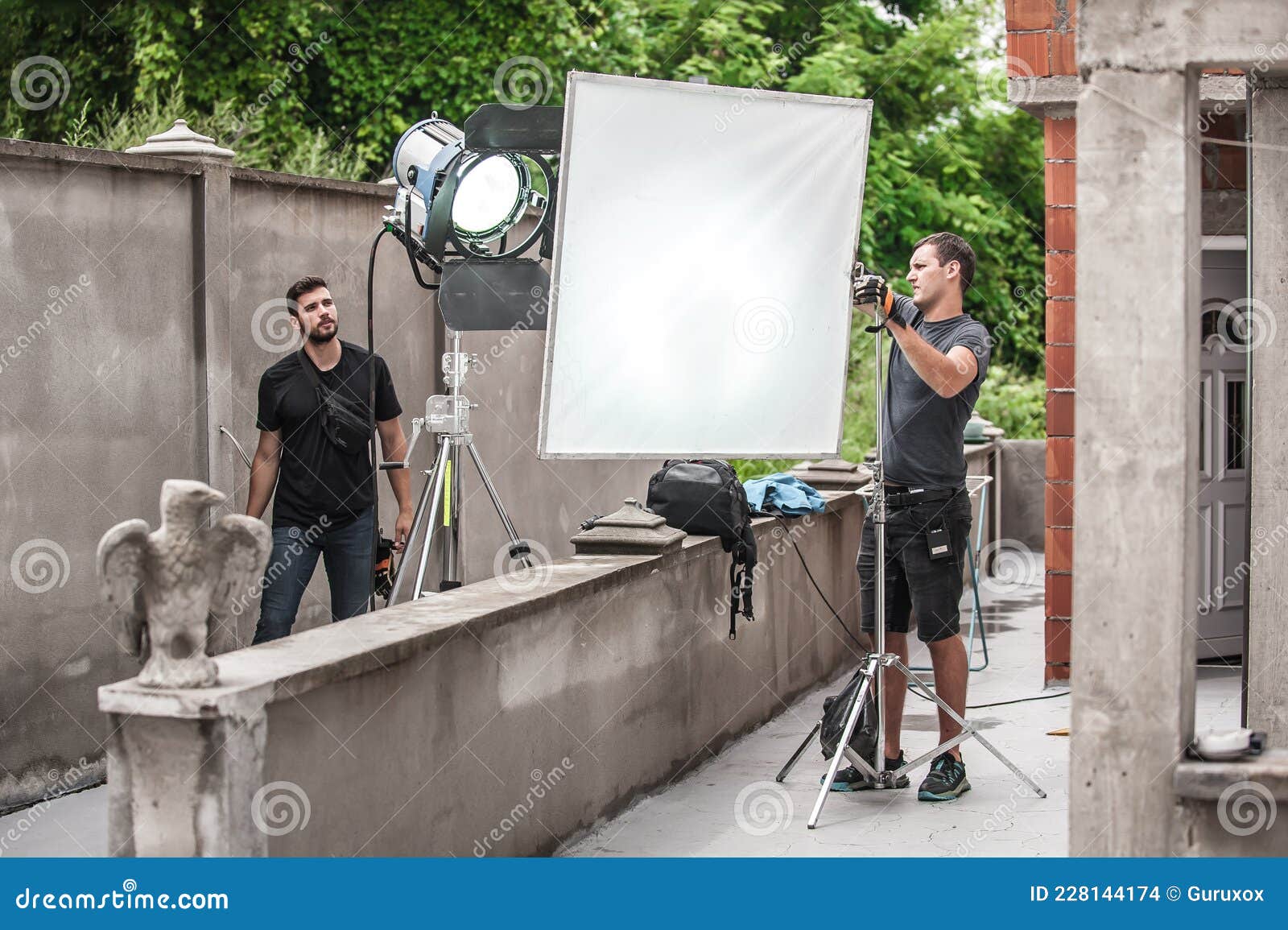 Lighting Technician Electric Engineer Adjusting Focus Of Lighting ...