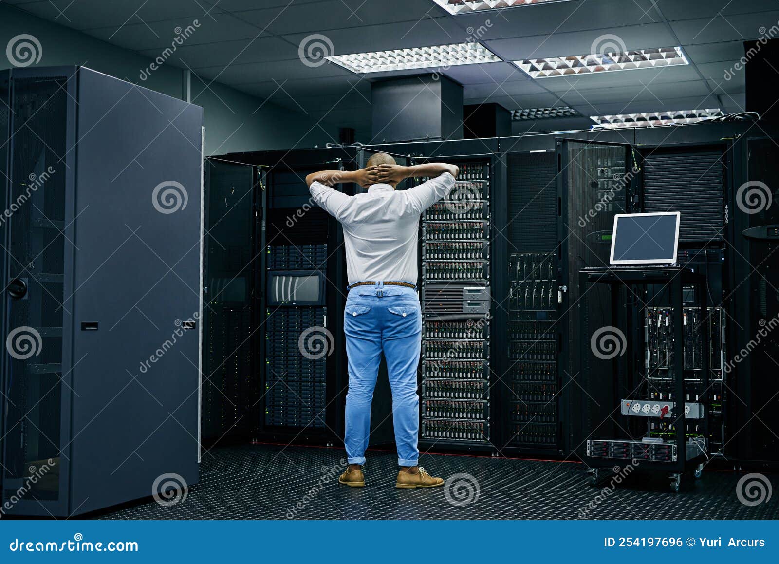 Behind the Scenes of an Error Message. Rearview Shot of an it ...