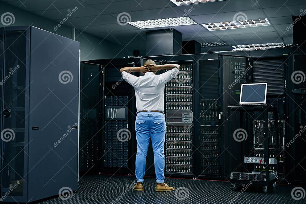 Behind the Scenes of an Error Message. Rearview Shot of an it ...