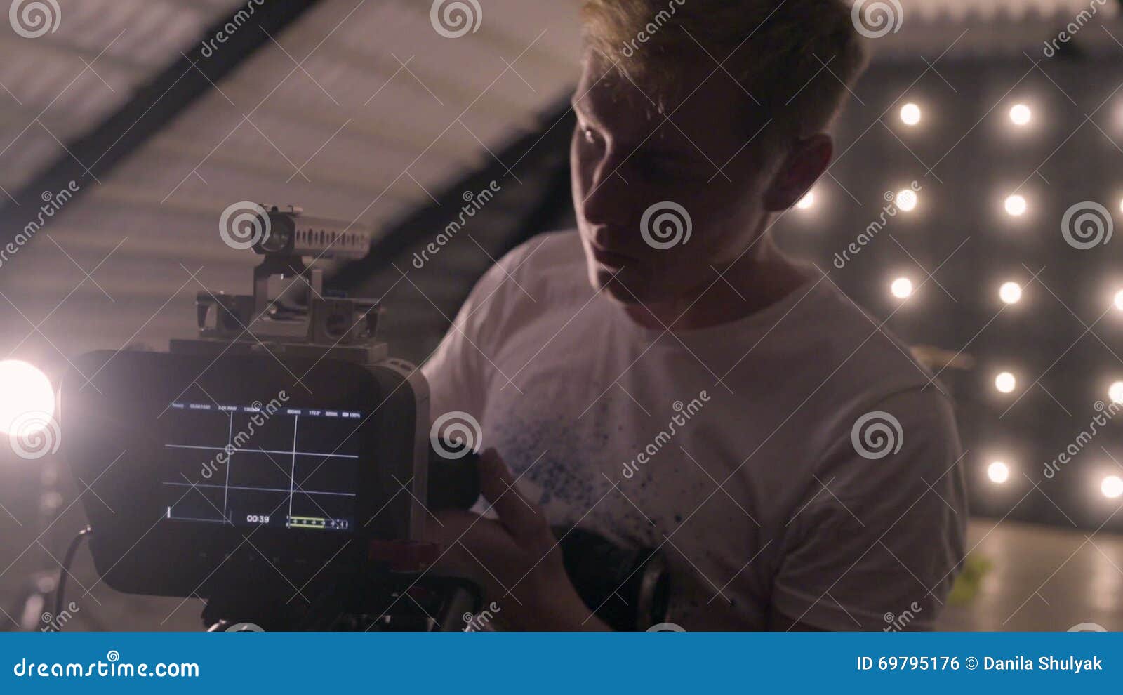 Behind the Scenes. Rock Band Shooting a Music Video in Studio. Stock ...