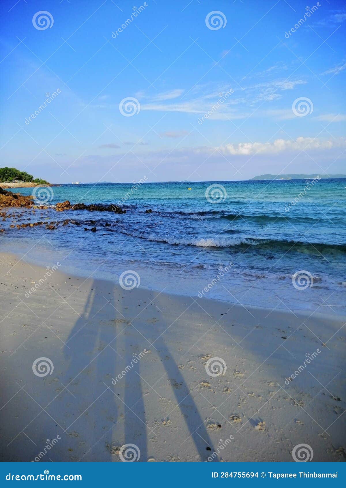 Two Shadow on the Beach Across the Sea and Sky Stock Photo - Image of ...