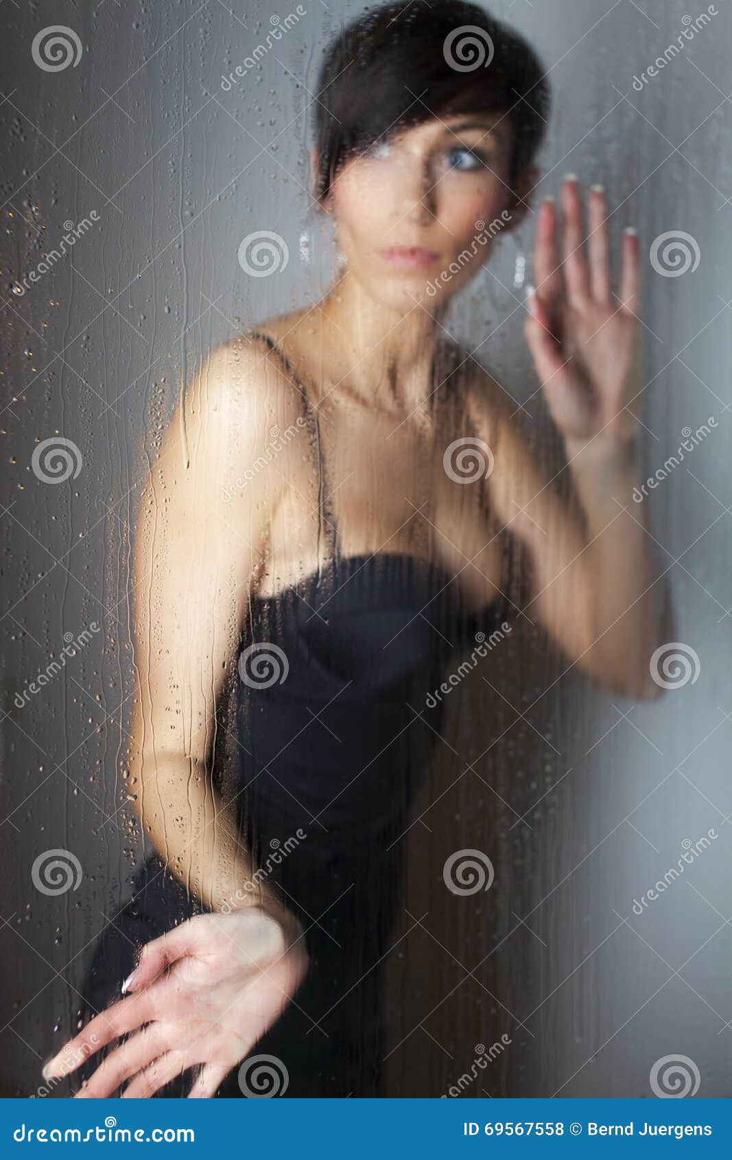 Behind the window stock photo. Image of pensive, adult - 69567558