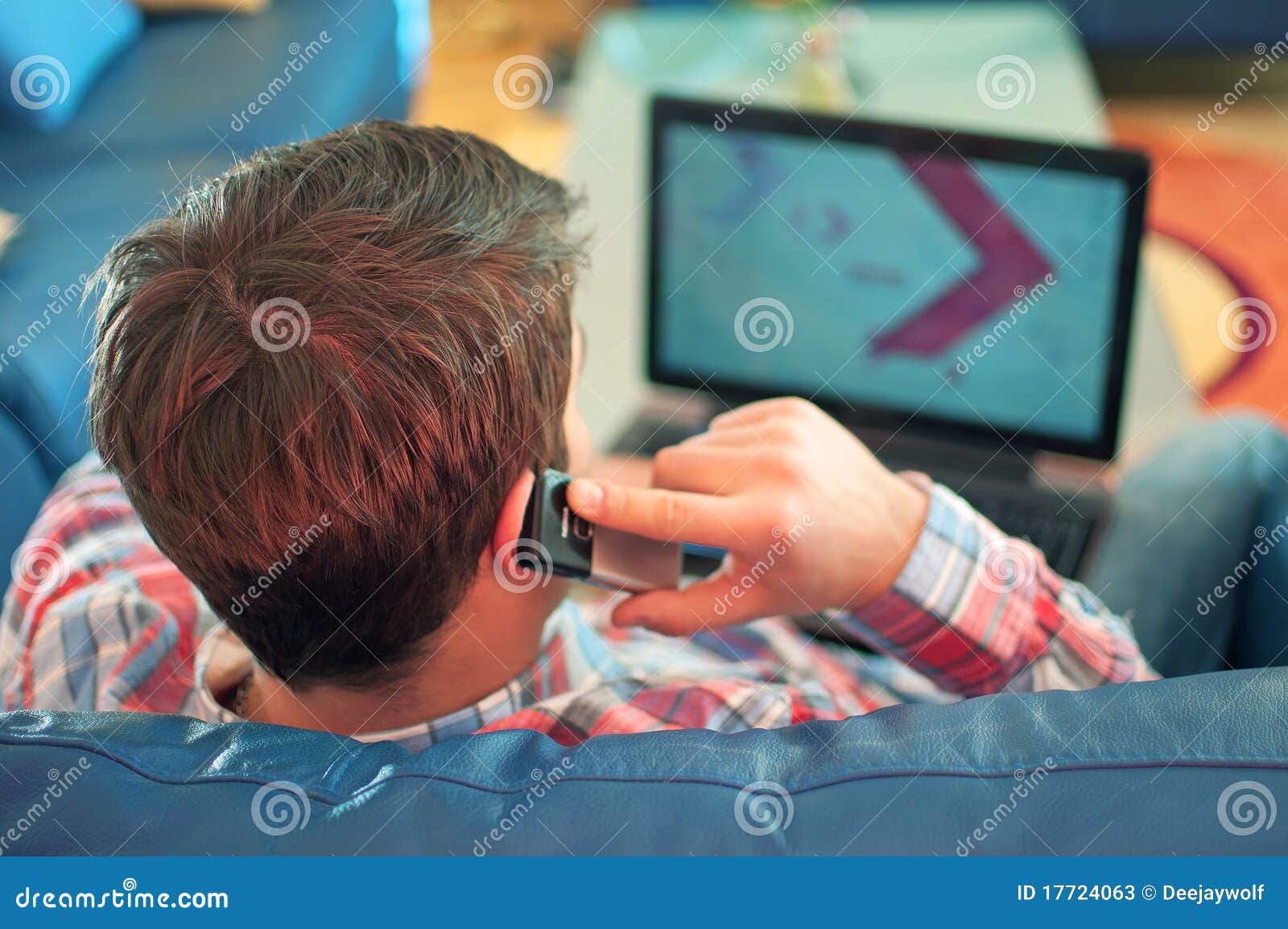 Behind of Young Guy Using Laptop and Phone Stock Image - Image of ...