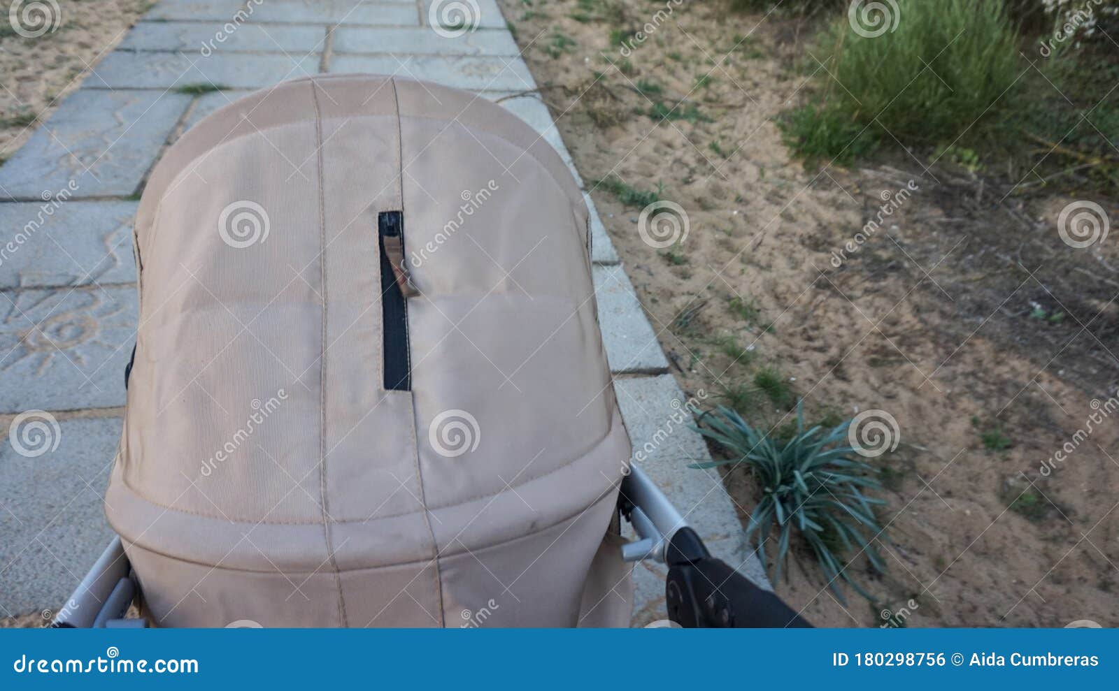 Beige Baby Stroller for Strolling on the Sand Stock Photo - Image of ...