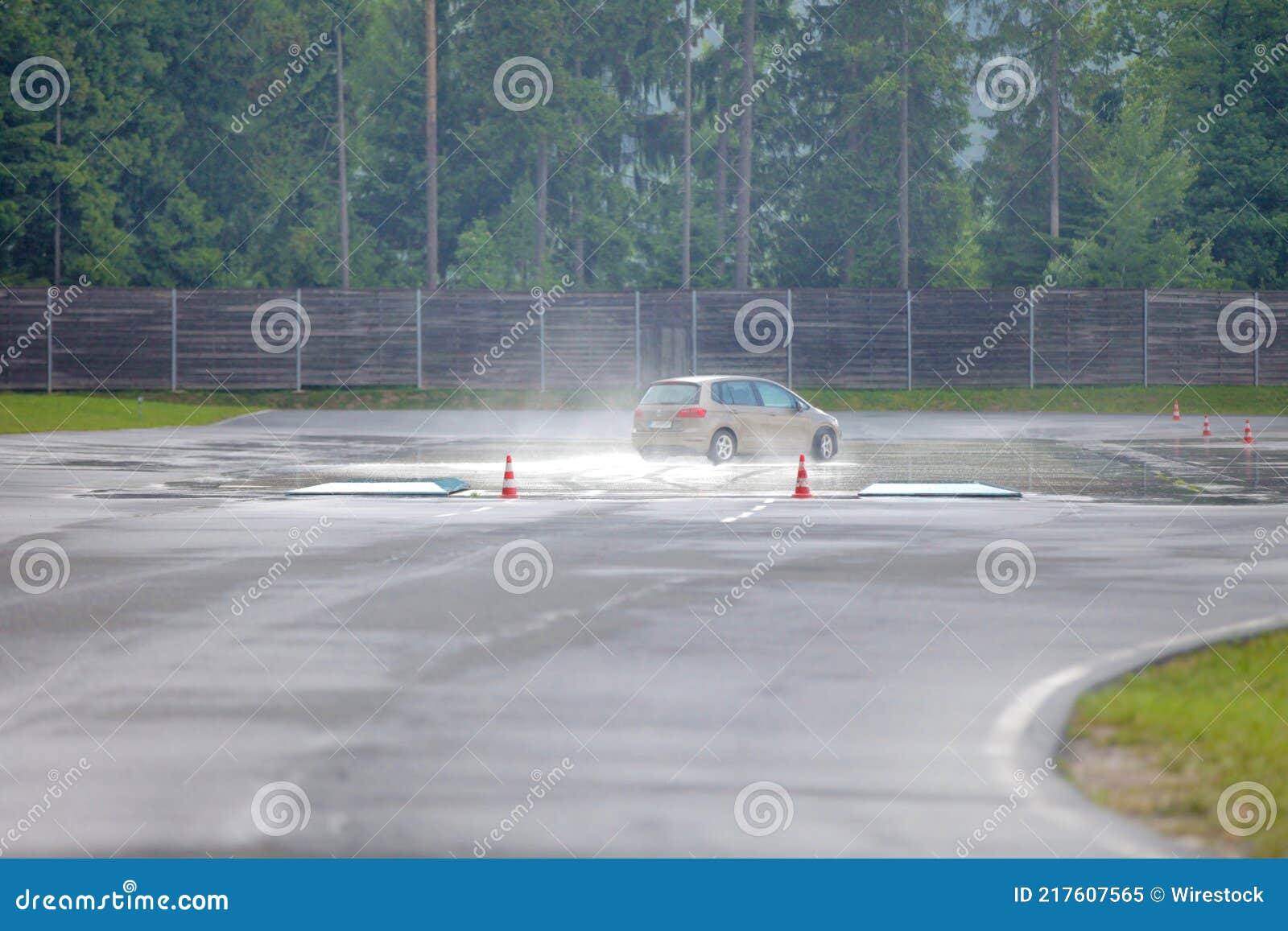 Beige Car Driving through a Puddle on the Street Stock Image - Image of ...