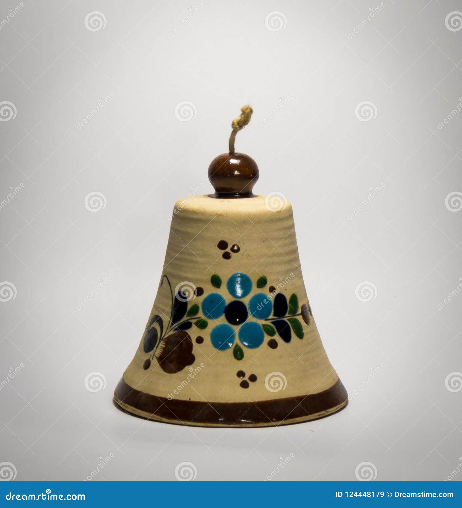 Beige ceramic bell stock image. Image of earthenware - 124448179