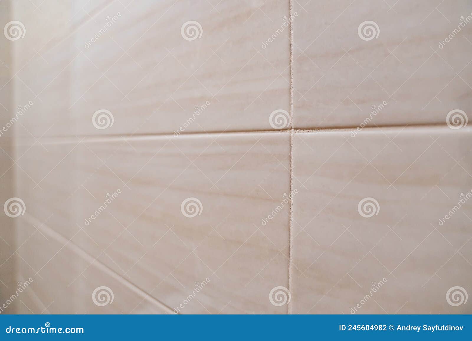 Beige Ceramic Tiles on the Wall. Materials for Renovation in the House ...