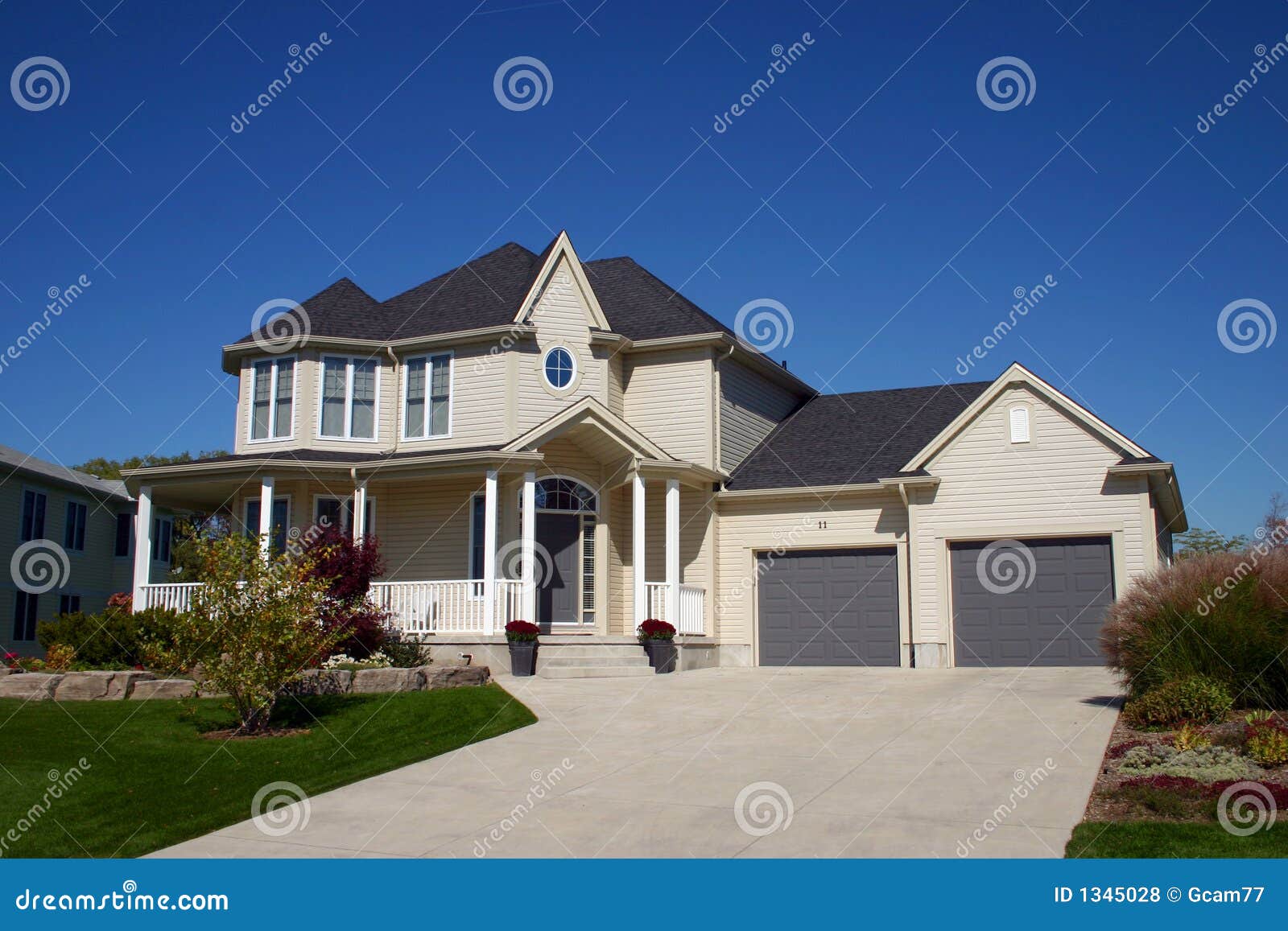 Beige Home with Peaked Roof. Stock Photo - Image of family, modern: 1345028