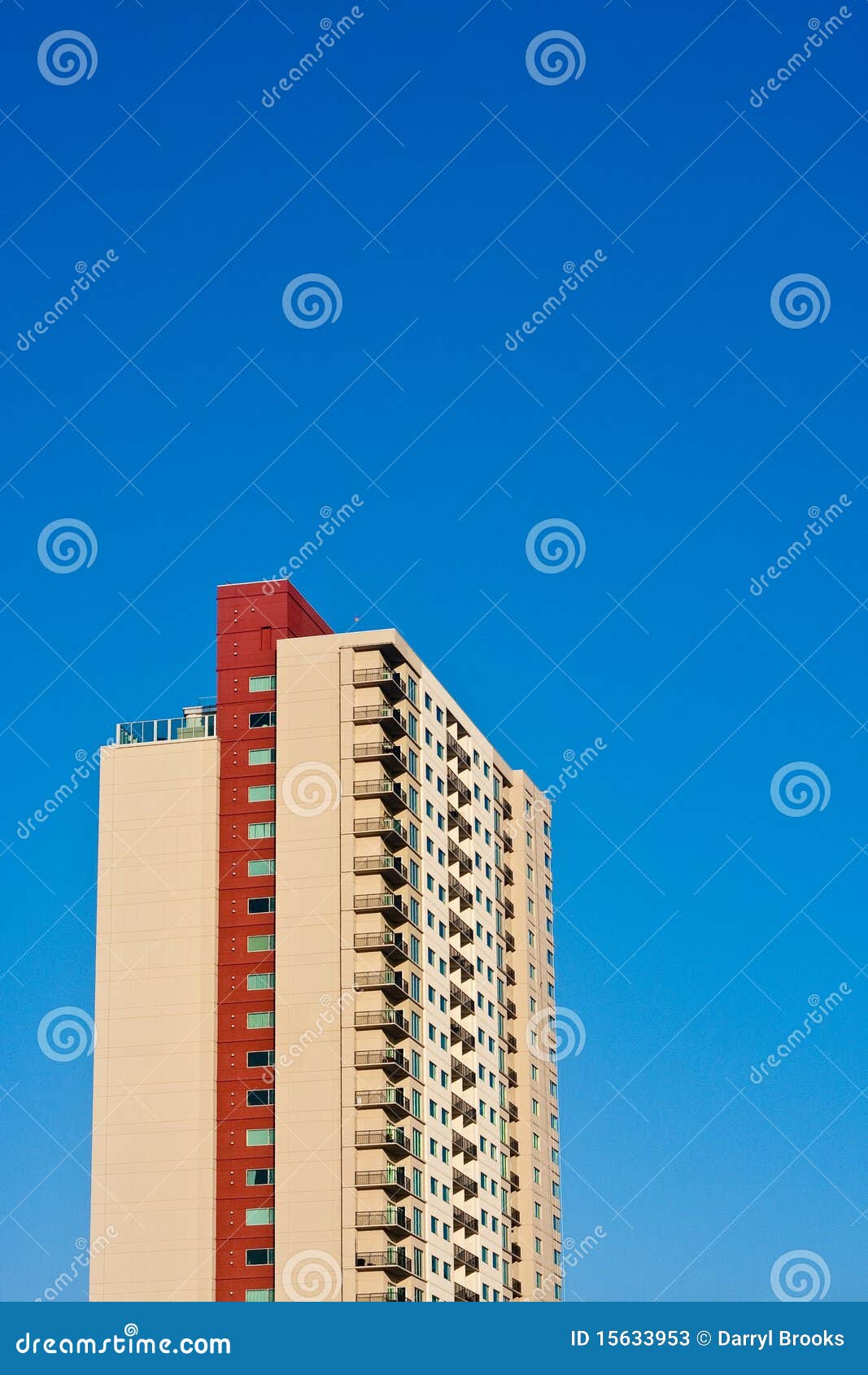 Beige and Red Condo Tower Rising into Blue Sky Stock Image - Image of ...