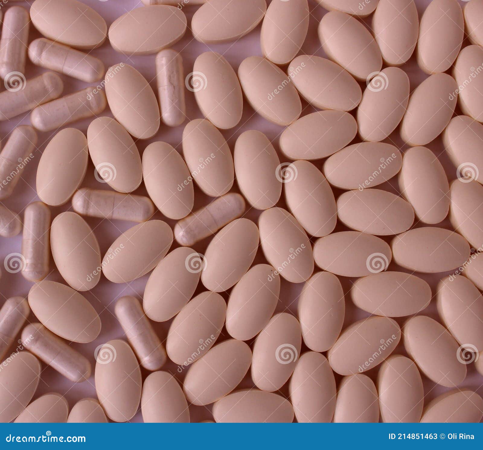 Beige Tablets of an Oblong Shape with a Solid Background. Stock Image ...