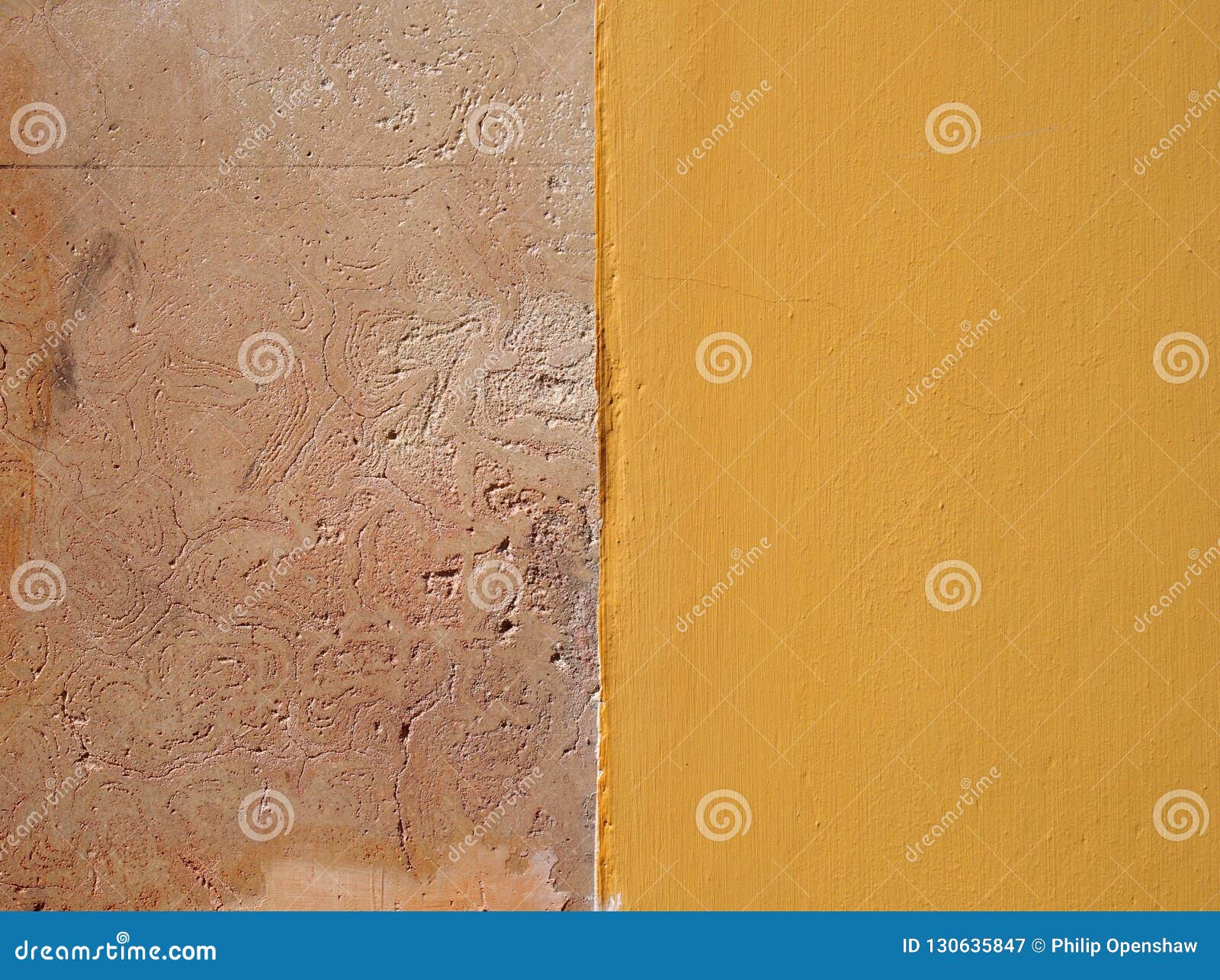 Beige Textured Limestone Wall Surface Half Painted in Bright Yellow ...