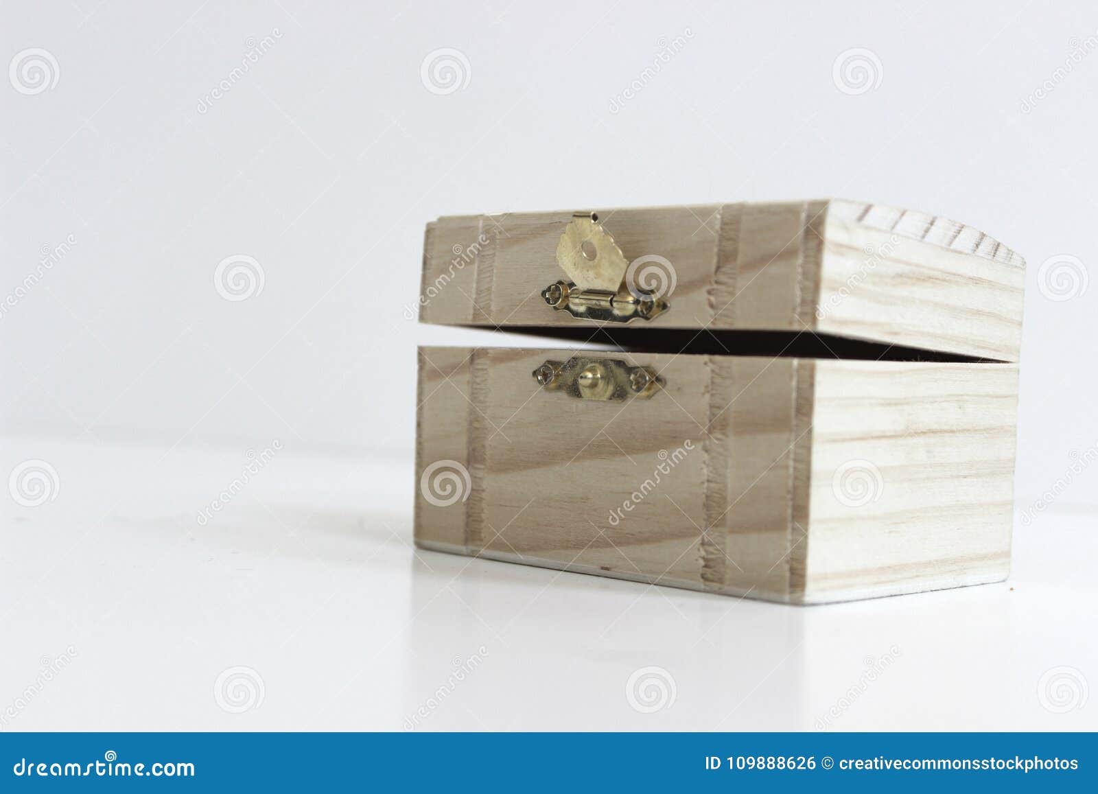 Beige Wooden Chest Trunk On White Surface Picture. Image: 109888626