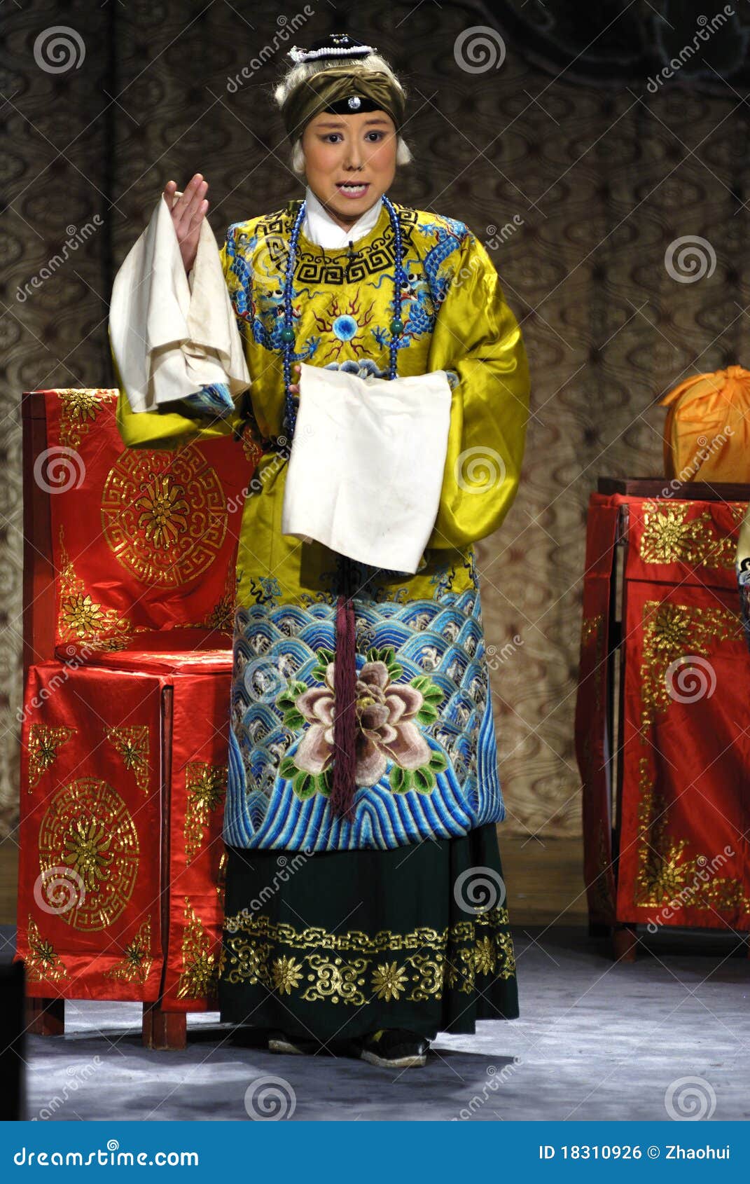Beijing Opera, On The Stage A Female Warrior Dances In A Bright ...
