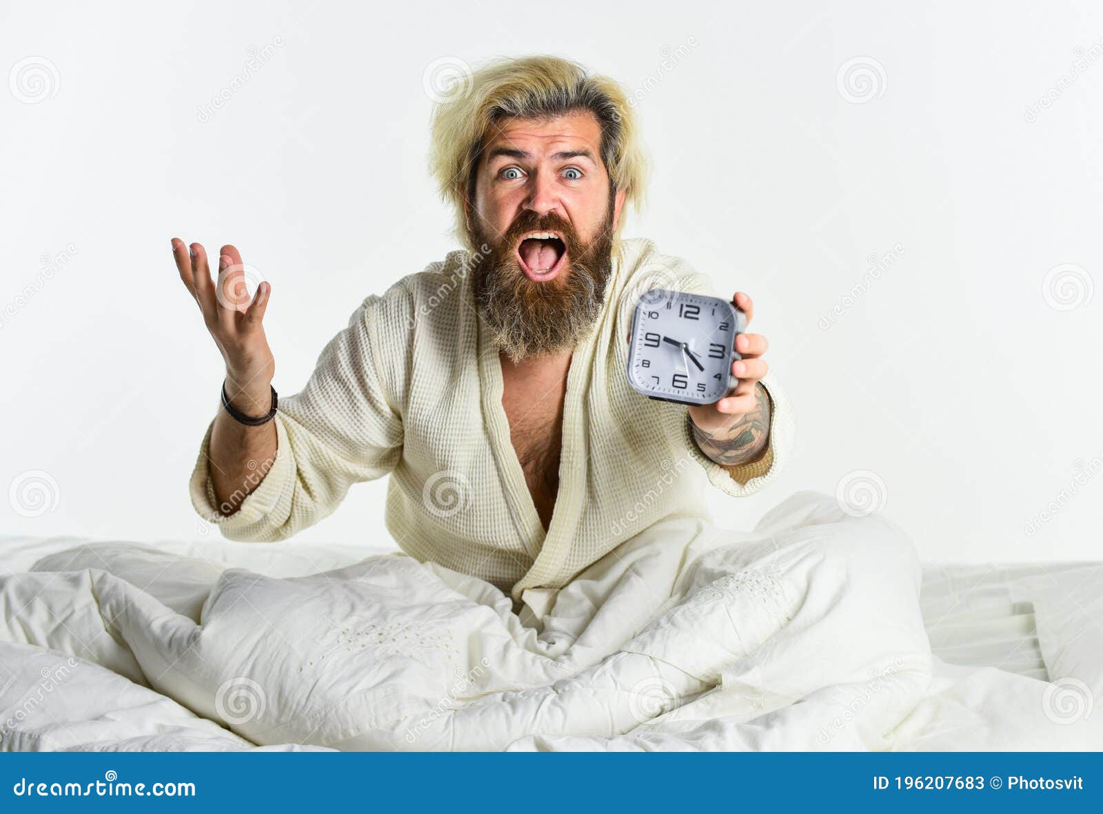 Being Late Is Habit Bearded Man In Bed With Alarm Clock Ringing Time