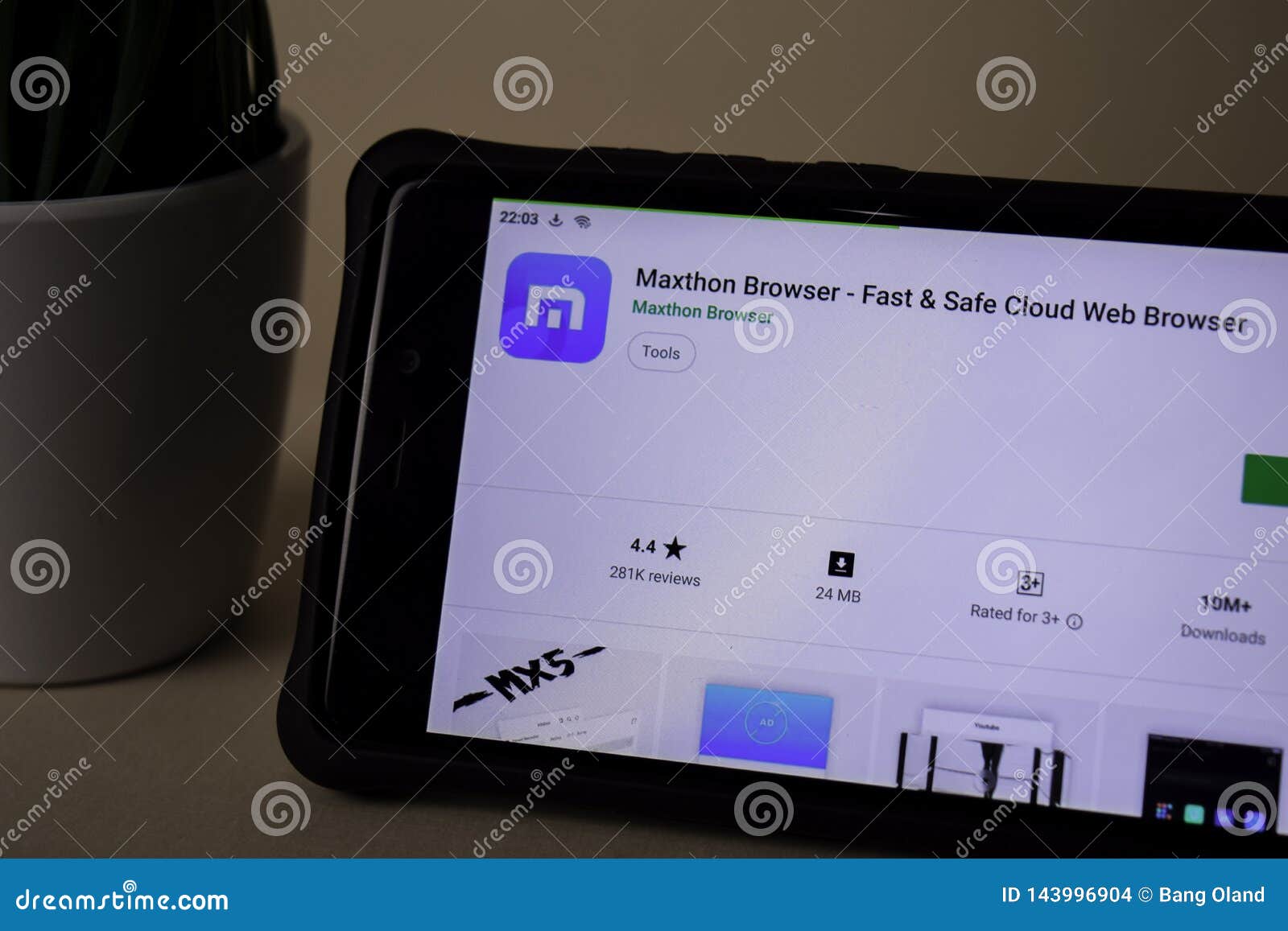 Maxthon Browser Dev Application on Smartphone Screen. Fast & Safe Cloud ...