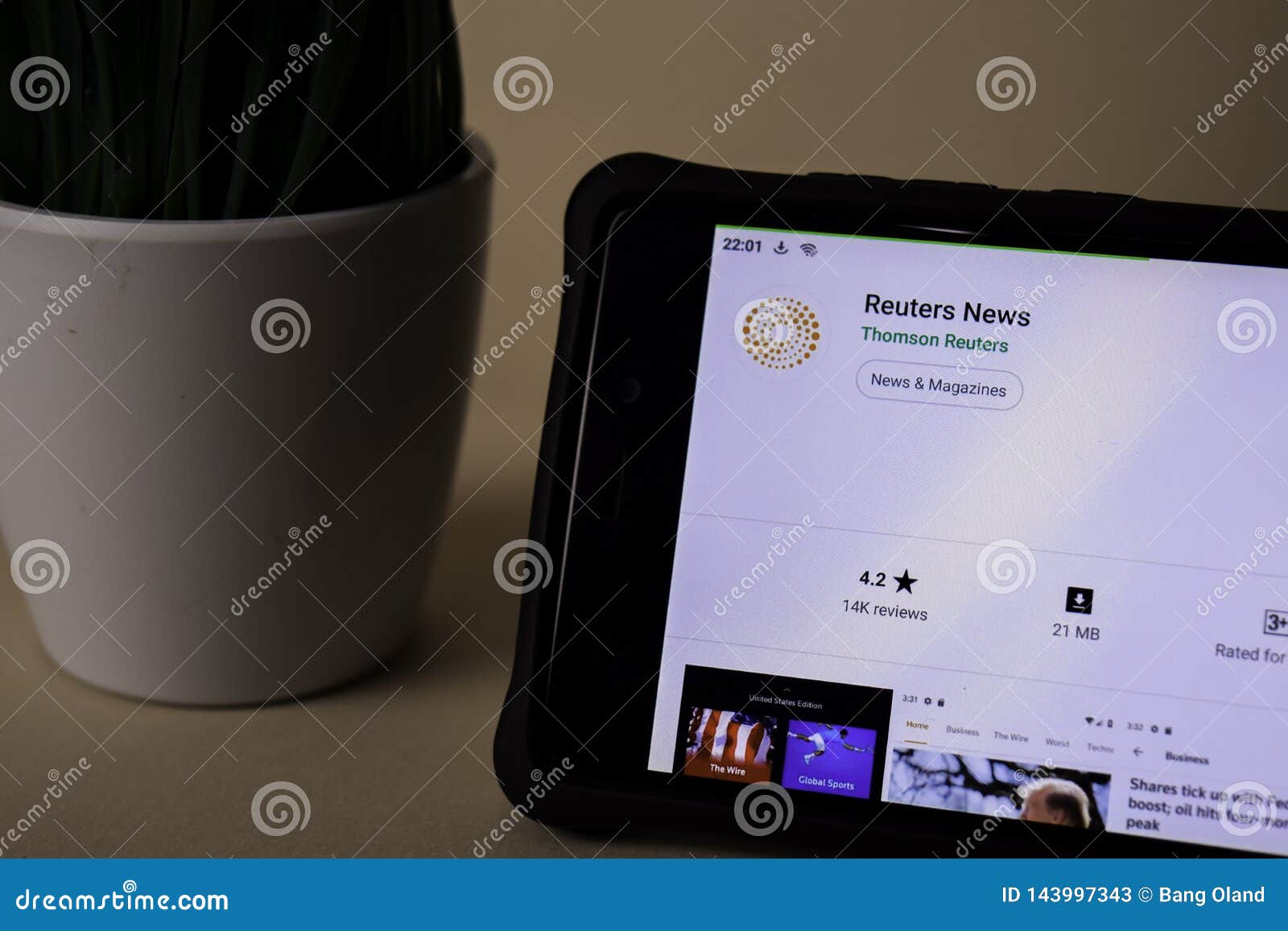 Reuters News Dev Application on Smartphone Screen. Reuters is a ...