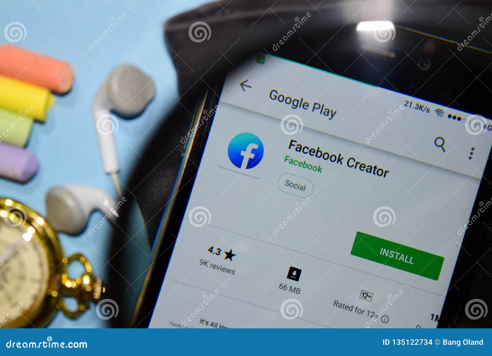 Facebook Creator Dev App with Magnifying on Smartphone Screen ...