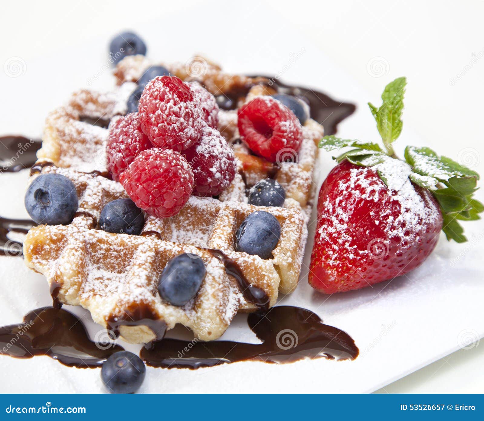 Belgian Waffle with Powdered Sugar, Chocolate Syrup, and Fruit O Stock ...