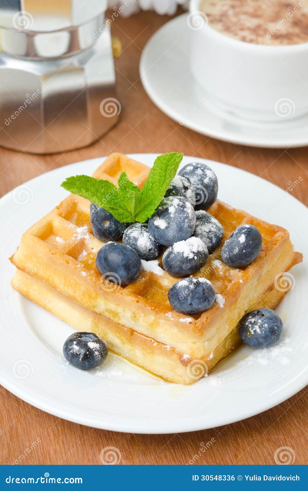 Belgian Waffles with Blueberries, Coffee and Fresh Fruit Stock Photo ...