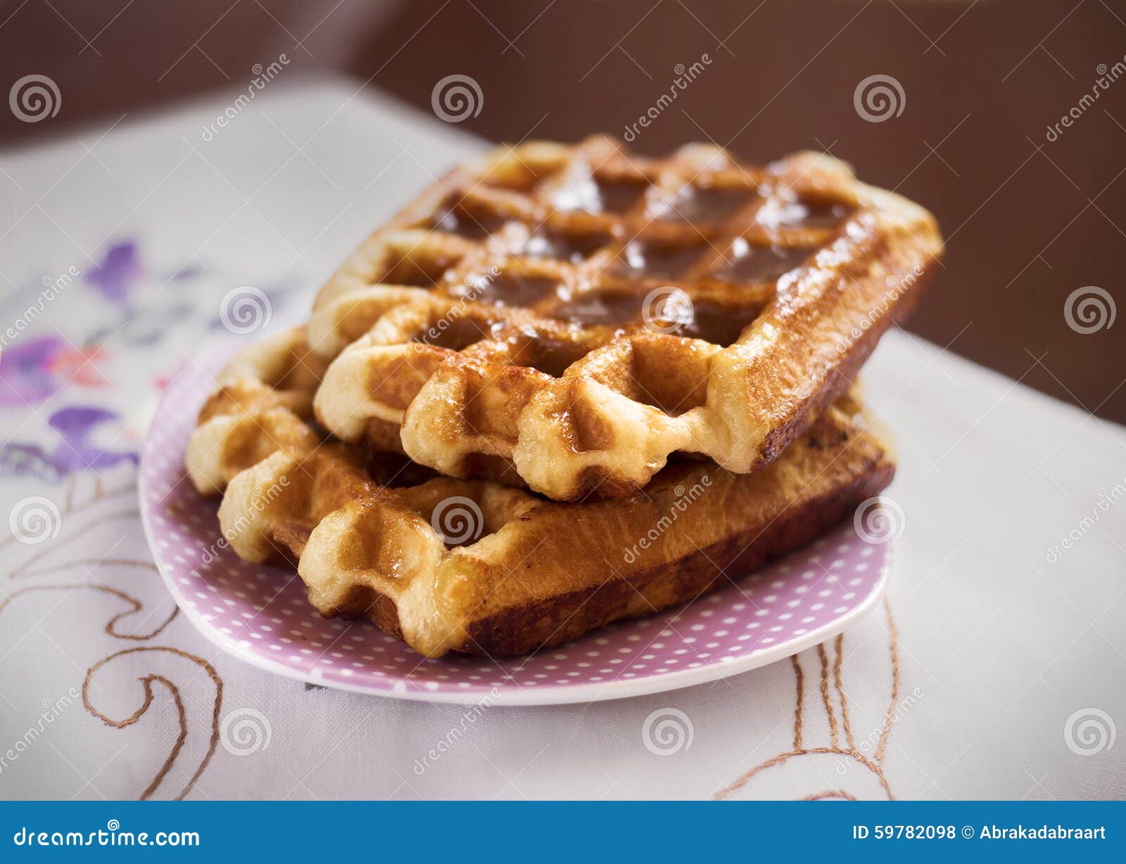 Belgian Waffles Topped with Caramel in a Plate Stock Photo - Image of ...
