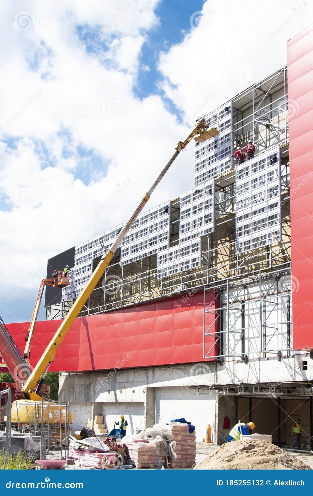 Construction Workers on Construction Site Making External Cladding ...