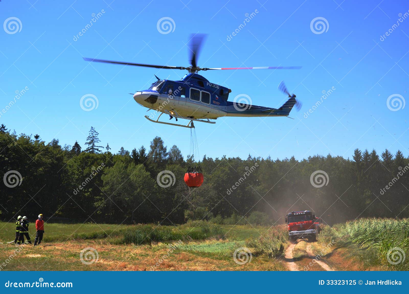 Bell 412 in action editorial image. Image of firefighters - 33323125