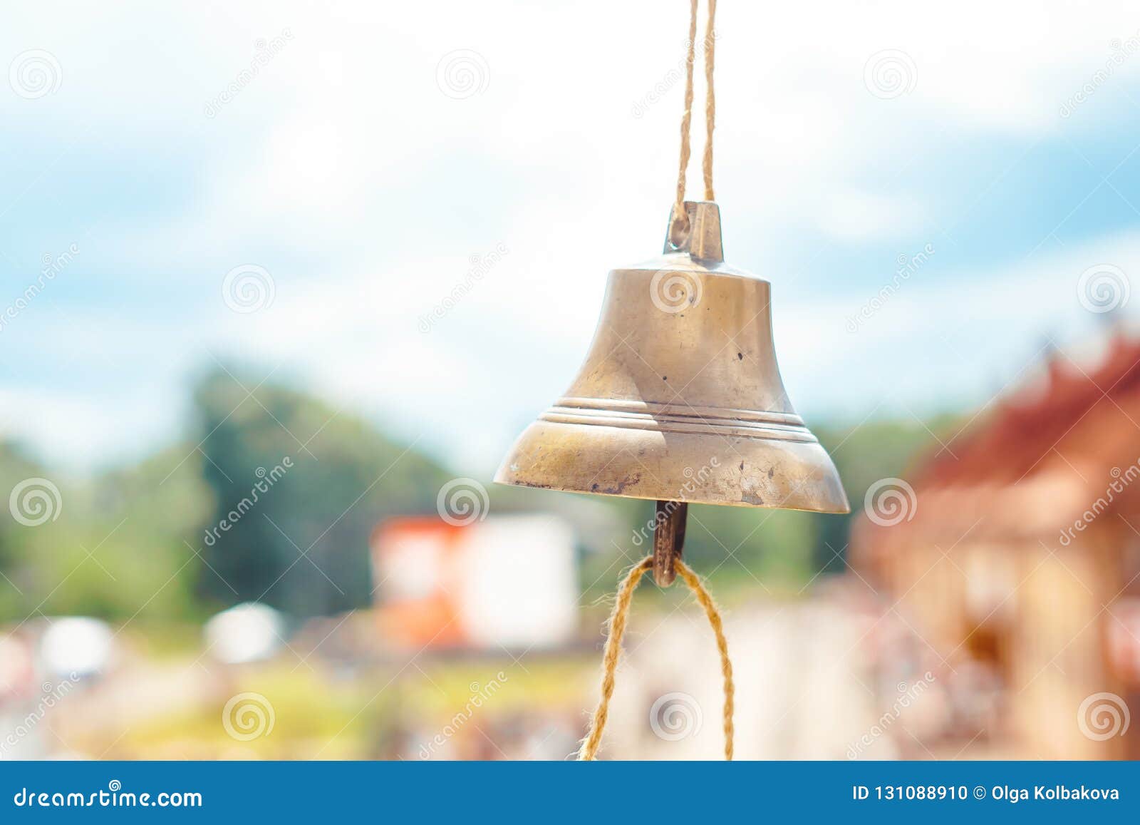 The bell hangs on a rope stock photo. Image of golden - 131088910