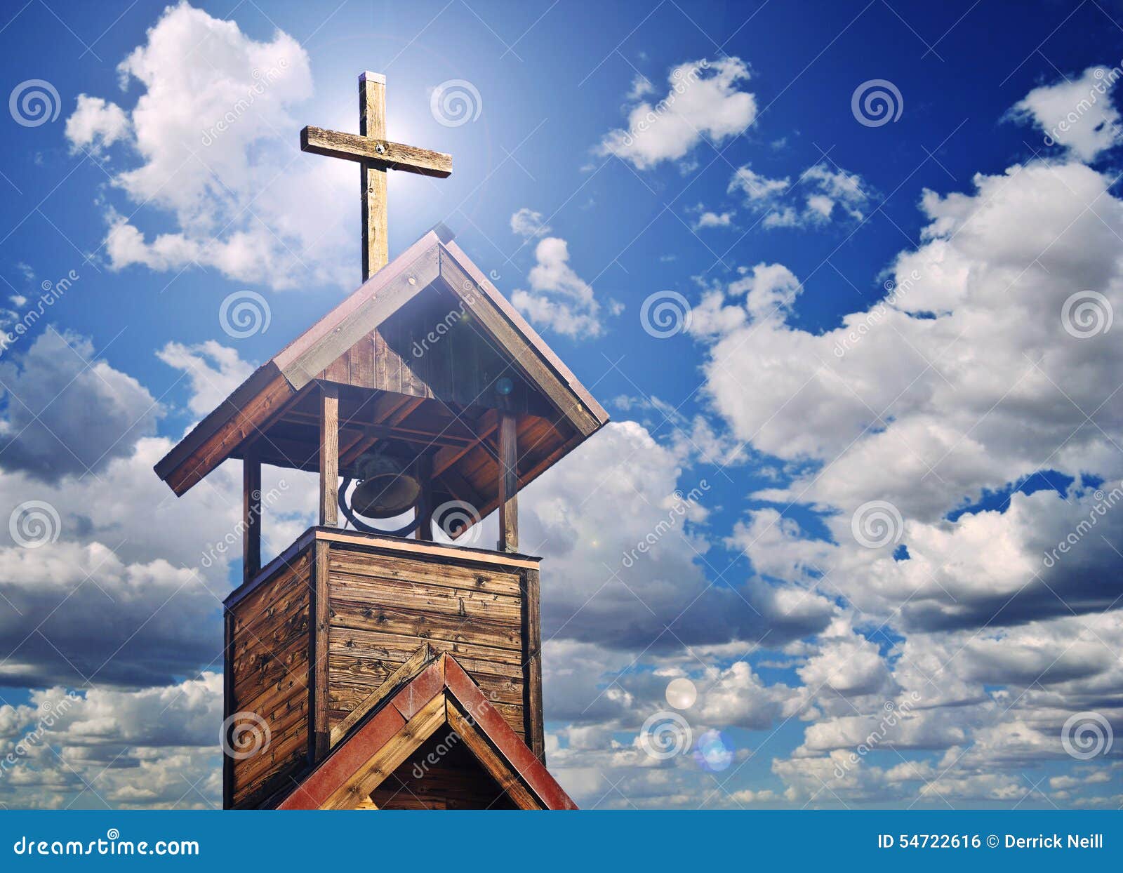 A Bell Tower with Cross and Heavenly Light Stock Photo - Image of ...