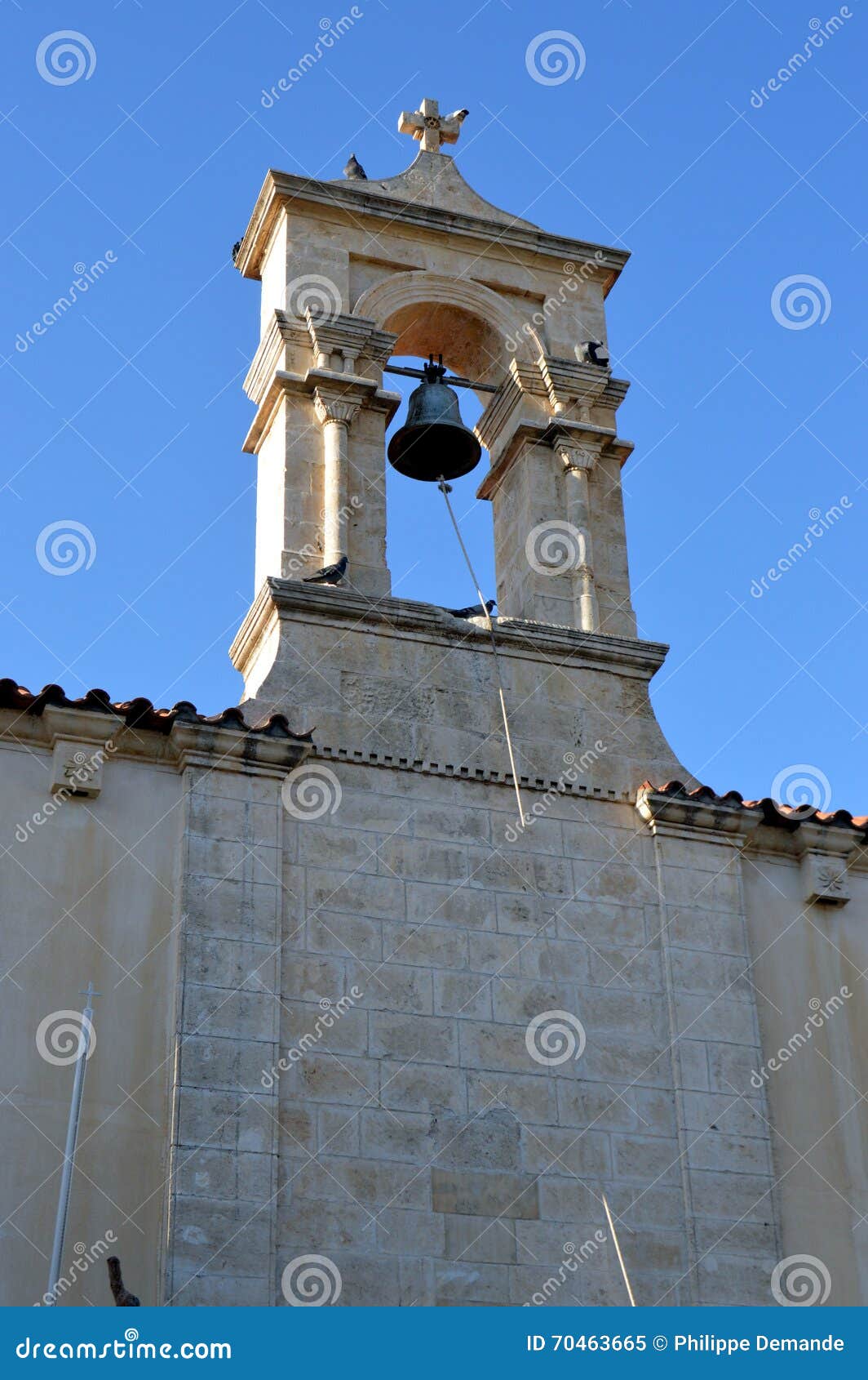 A bell tower in stones. stock image. Image of texture - 70463665