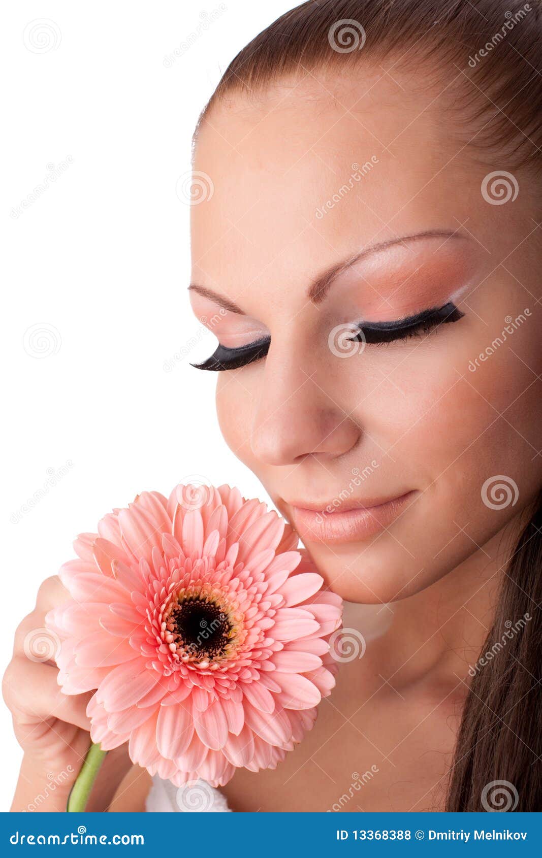 Bella donna con un fiore fotografia stock. Immagine di sano - 13368388