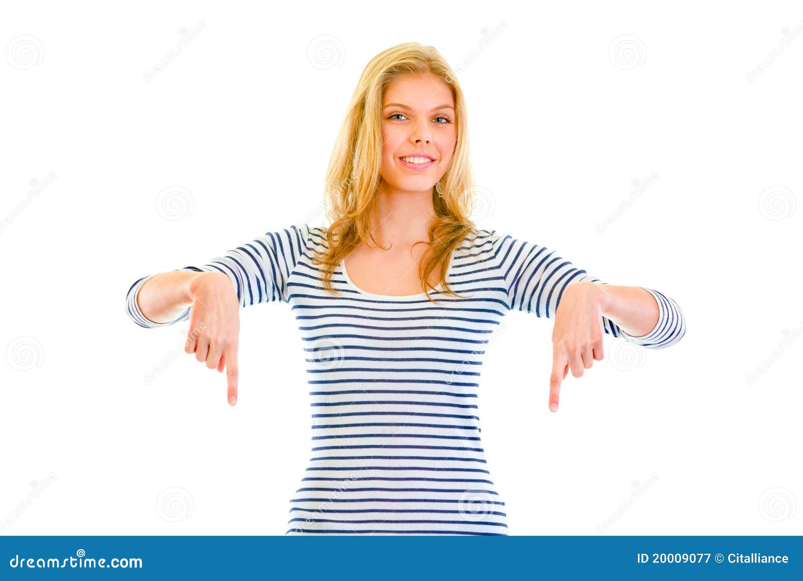 Belle Fille De Ladolescence De Sourire Dirigeant Des Doigts Vers Le