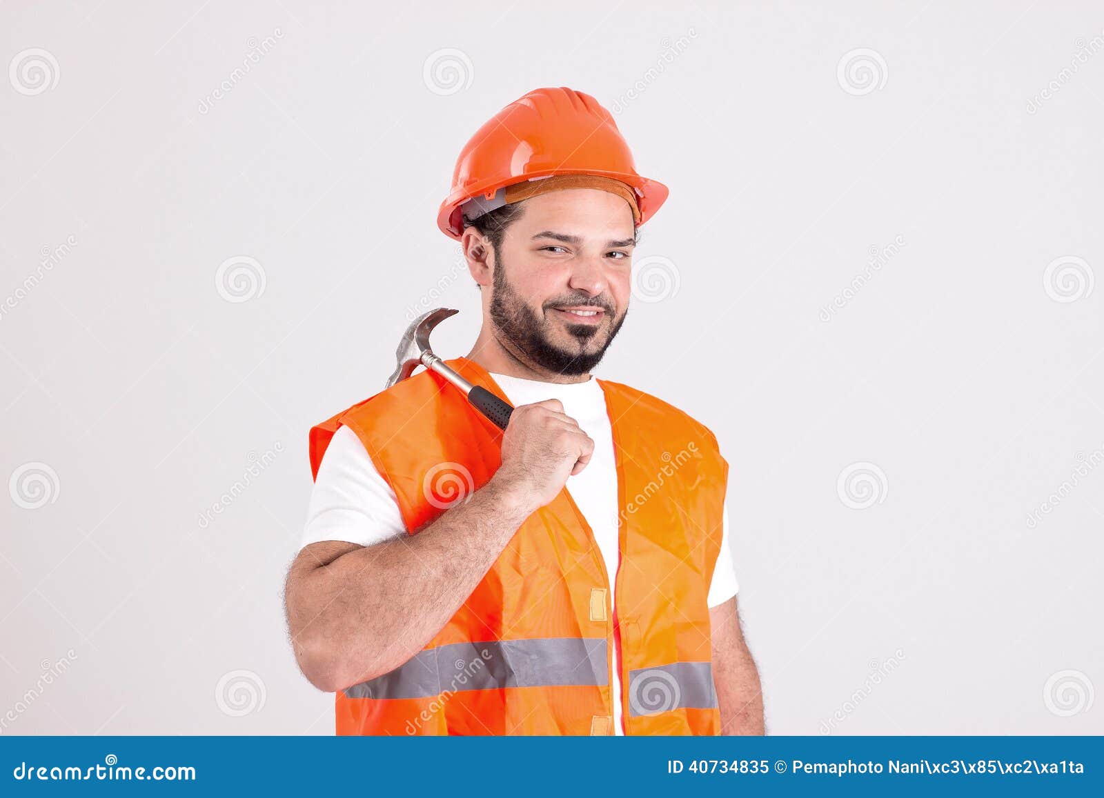 Bello Muratore Con Il Muratore Hammer Immagine Stock - Immagine di ...