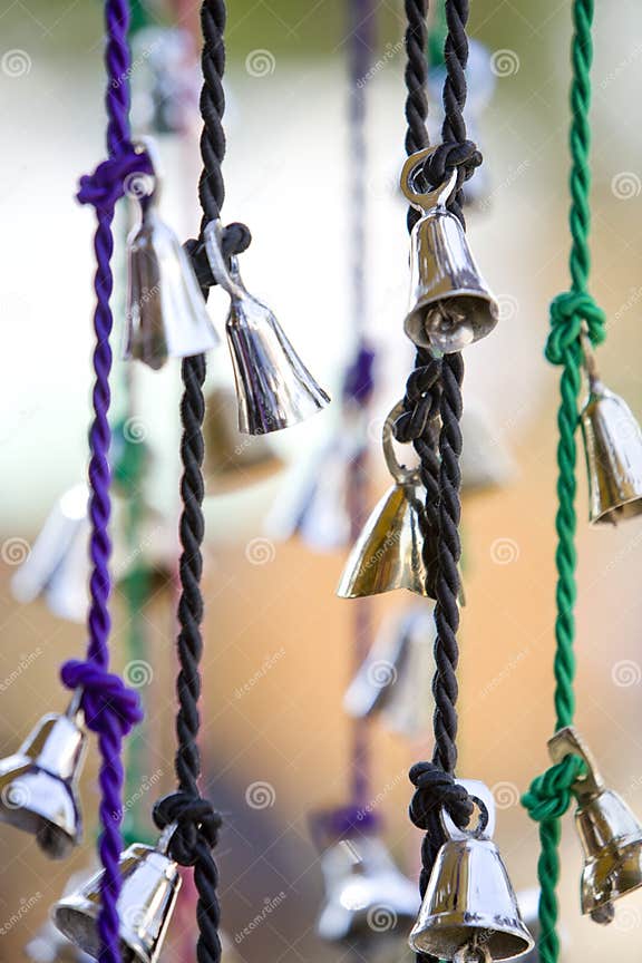 Bells on String 1 stock image. Image of silver, cord, bells - 5087527