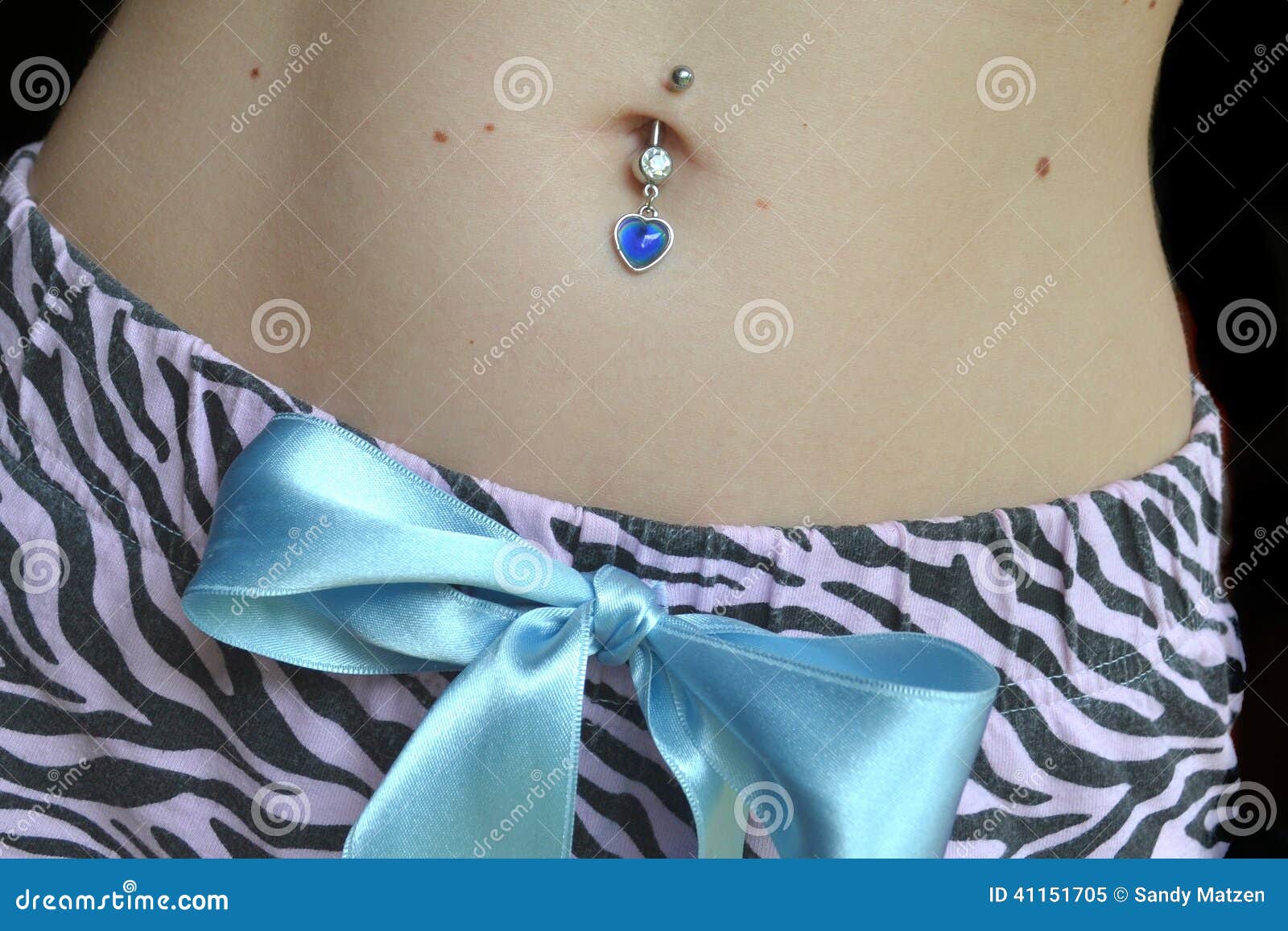 Belly button piercing stock image. Image of blue, jewelry - 41151705