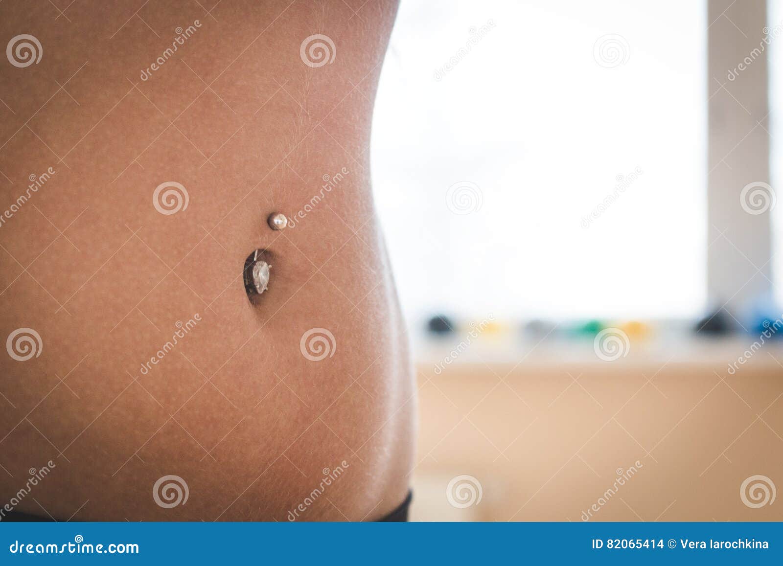 Belly of Young Woman with Pierced Navel Stock Photo - Image of ...