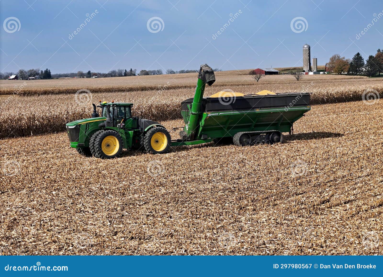 John Deere 9420R Tractor Pulling a Brent 2096 Grain Cart Loaded with ...