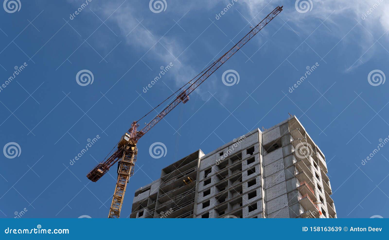 Modern Building Under Construction with Crane. from Below of ...