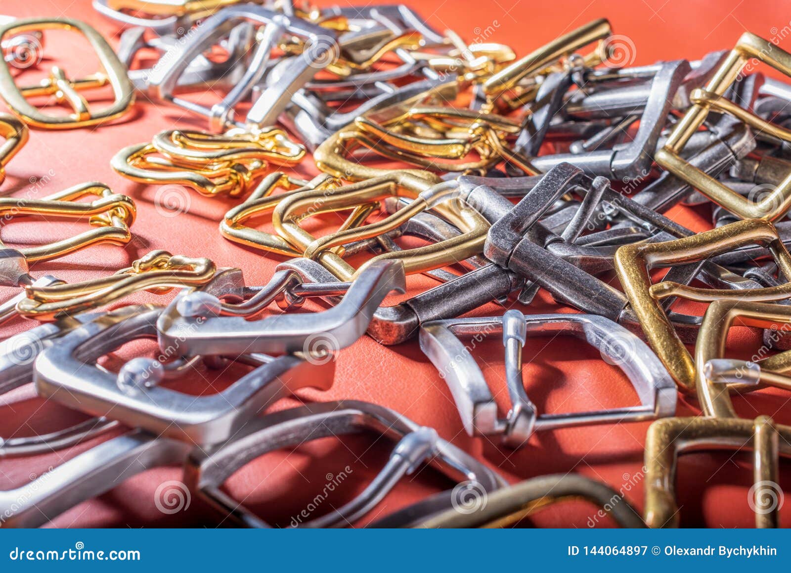 Belt Buckles on Red Full Grain Leather Background Stock Image - Image ...