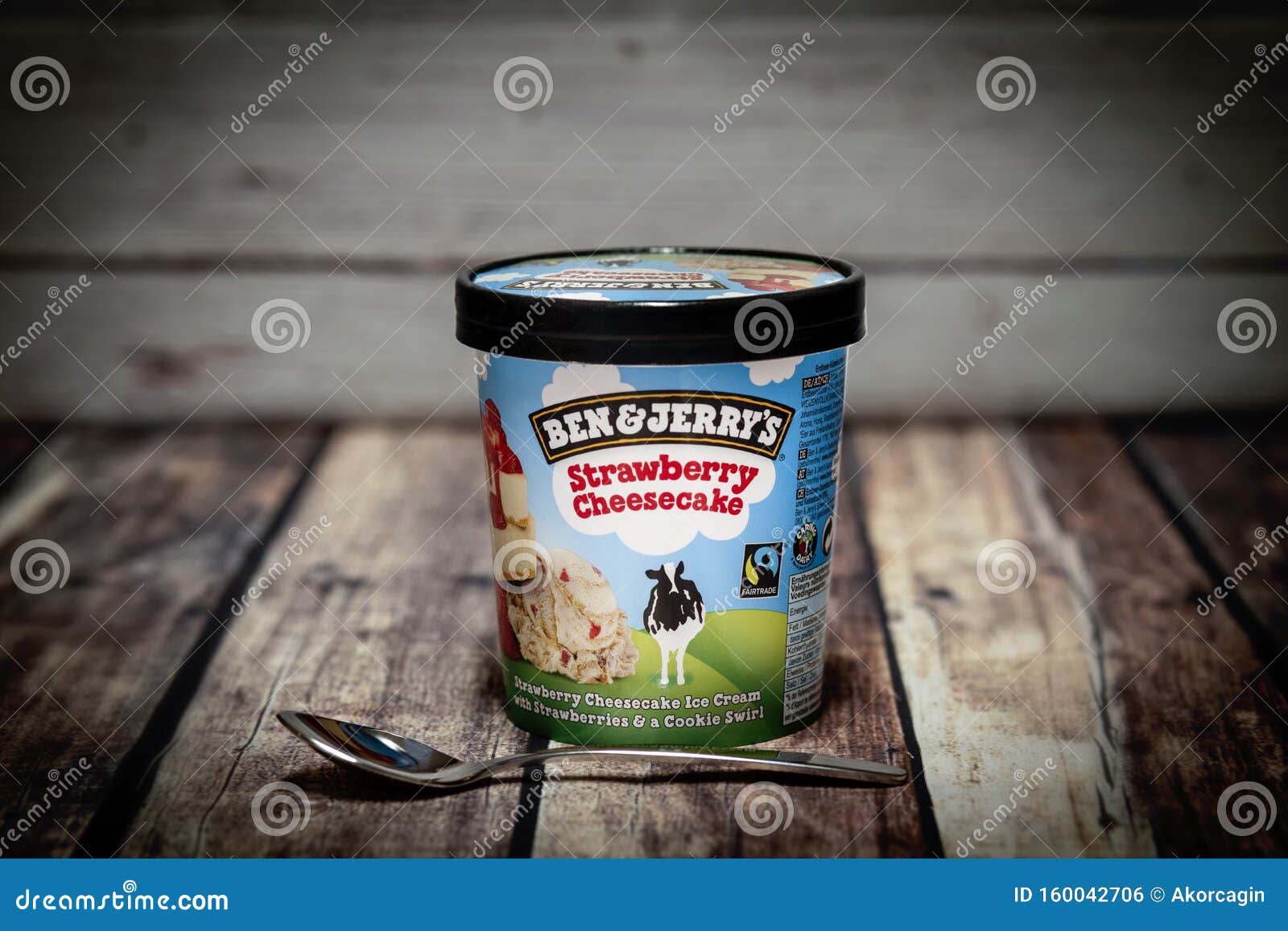 Ben & Jerry`s Strawberry Cheesecake Soft Ice Cream on the Woodenen ... Ben & Jerry`s Strawberry Cheesecake Soft Ice Cream on the Woodenen ...