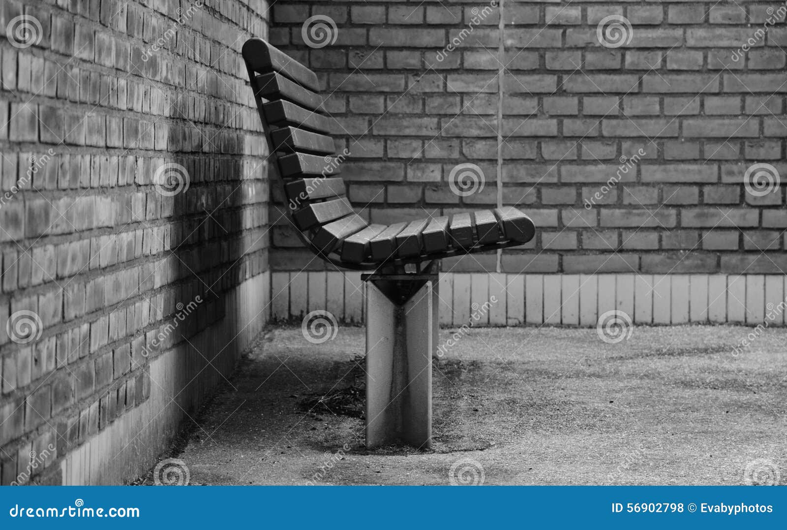 Bench against the wall stock photo. Image of bench, blackandwhite ...